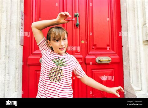 Cute School Girl Playing With Red Fidget Spinner Popular Stress