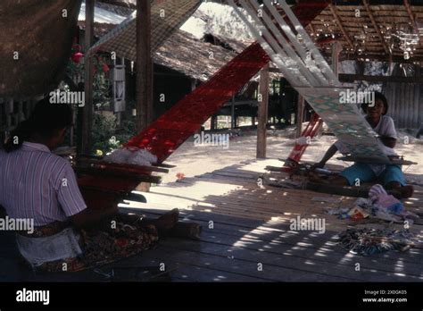 Two Female Refugees From Sulu Lake In A Weaving Village In Yakan