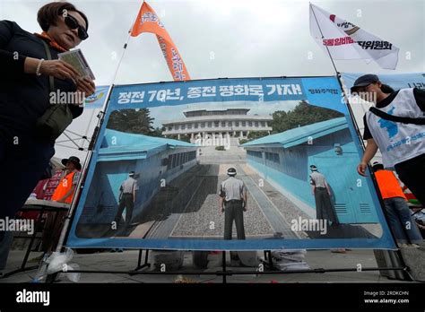 A Banner Shows An Image Of The Border Village Of Panmunjom During A