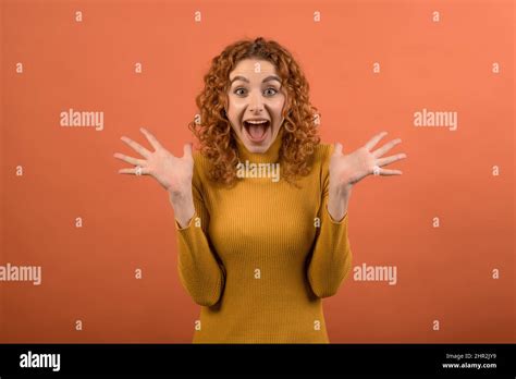 Portrait Of An Attractive Young Excited And Surprised Caucasian
