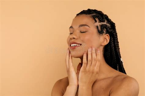 Facial Skincare Portrait Of Happy African Female Touching Face Caring