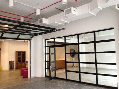 Contemporary Aluminum And Clear Tempered Glass Garage Door With Passage