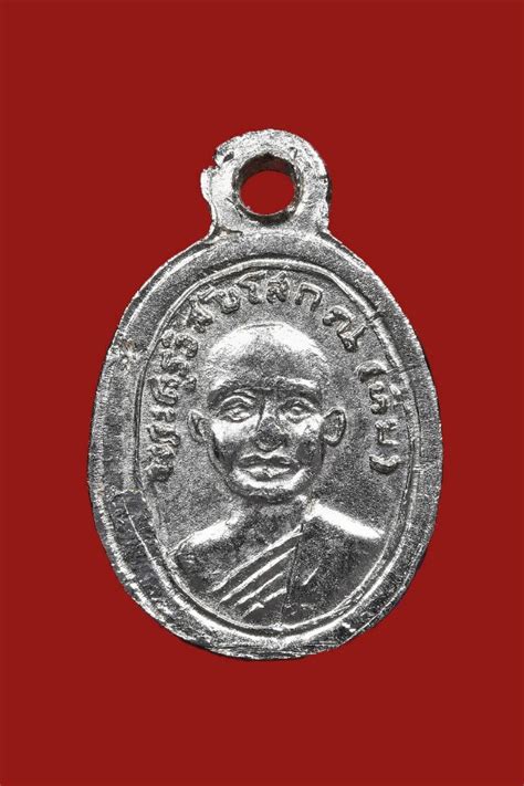 หลวงพ่อทวด วัดช้างให้ จ ปัตตานี 7 24 เหรียญเม็ดแตงลพ ทวด วัดช้างให้บล็อกโดเรม่อน หลังณ แตก นิยม