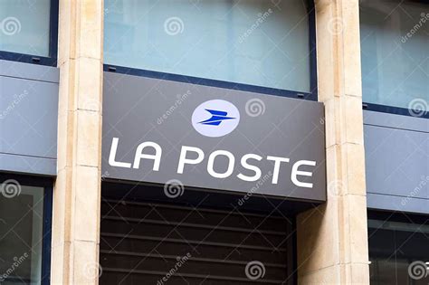 Entrance And Signpost Of French Postal Service And The Postal Bank In