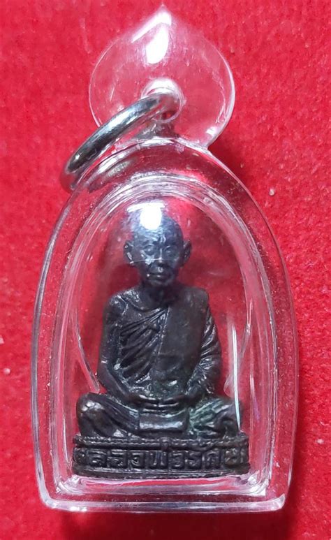 รูปหล่อ หลวงพ่อรักษ์ วัดน้อยแสงจันทร์ Ennxo