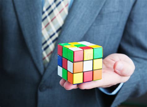 Businessman Holding Rubik Cube In His Hands Editorial Photography
