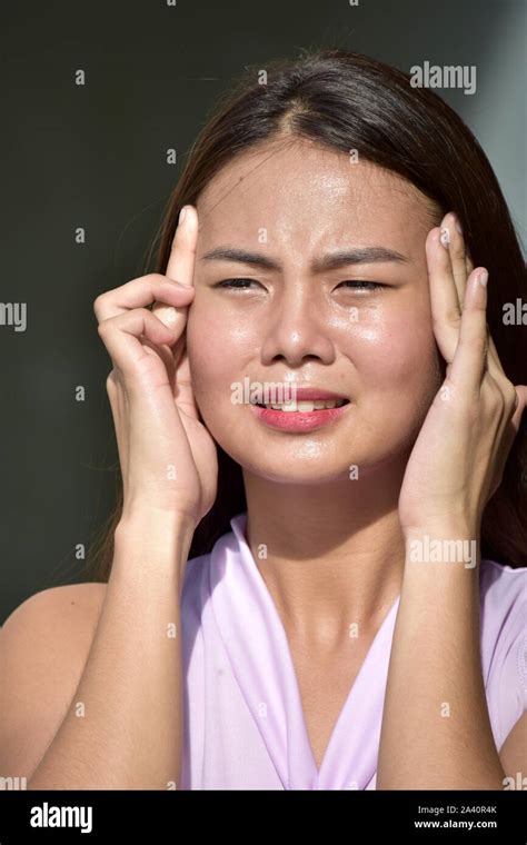 Stressful Beautiful Filipina Woman Stock Photo Alamy