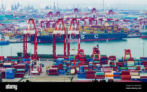qingdao china february 2 2024 the container loading and unloading