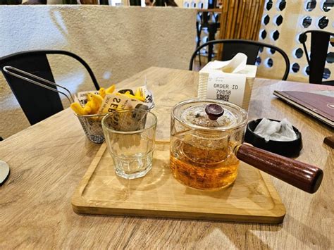 Premium Photo Serve Chamomile Tea With French Fries