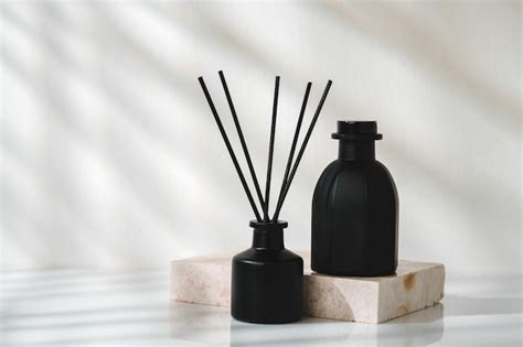 Premium Photo Elegant Aroma Diffuser With Black Reeds On A Marble