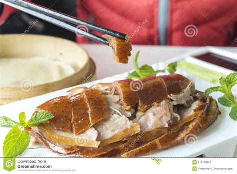 Enjoying Roasted Peking Duck Stock Image Image Of Restaurant Bamboo