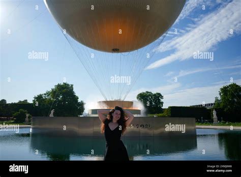 Solène Ratinaud Poses For A Picture In Front Of The Cauldron With The