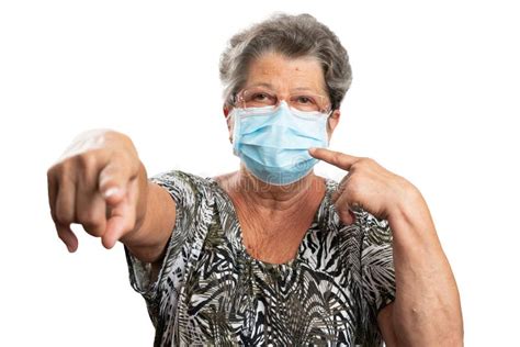 Woman Pointing Fingers At Medical Or Surgical Mask And Camera Stock