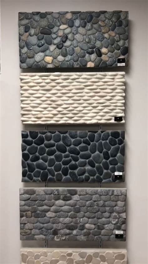 Four Different Types Of Stone Tiles Hanging On The Wall