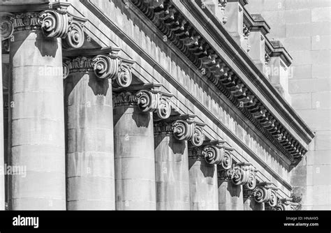 A Black And White Photo Of A Row Ionic Columns On The Toronto Power