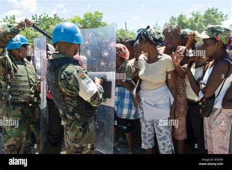 Un Peacekeepers Distribute Emergency Food To Haitians In Gonaives After