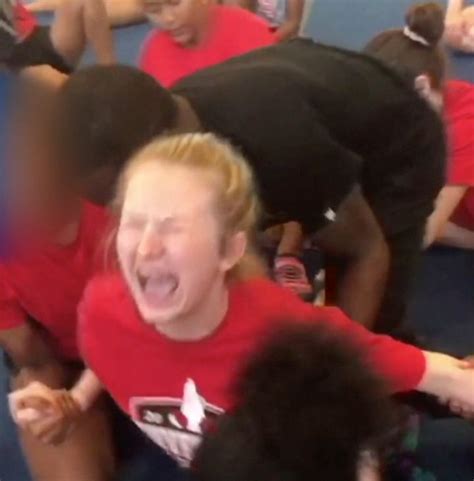 Video Shows High School Cheerleader Crying As Coach Forces Her Into