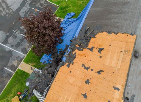 How To Fix Damaged Roof Shingles Eastern Exteriors Llc