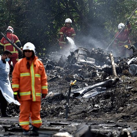 Malaysia Plane Accident Kills 10 Including 2 Motorists After Crash On