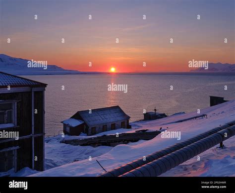 Sunset Over The Mine Russian Coal Mining Town Barentsburg At Fjord