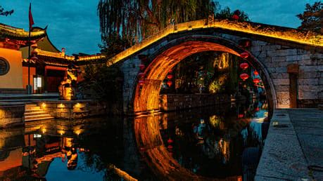 Night Town Bridge View Ancient Powerpoint Background For Free Download Slidesdocs