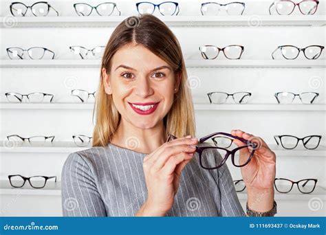 Woman Choosing Eyeglass Stock Image Image Of Eyeglass 111693437