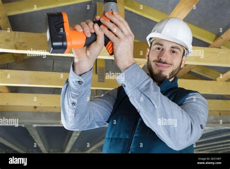 Installing A Spotlight In The Room Stock Photo Alamy