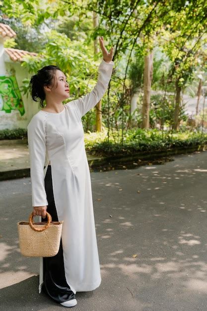Premium Photo Portrait Of Vietnamese Woman Wearing National Dress Ao