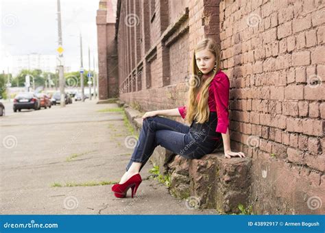 Young Female Teen Girl Pose Against A Brick Wall Stock Image Image