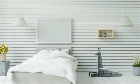 밝은 배경에 격리된 침실의 침대 뒤에 있는 나무 바닥의 현대적인 인테리어에 있는 포스터 프레임의 모형 3d 렌더링 3d 그림 0