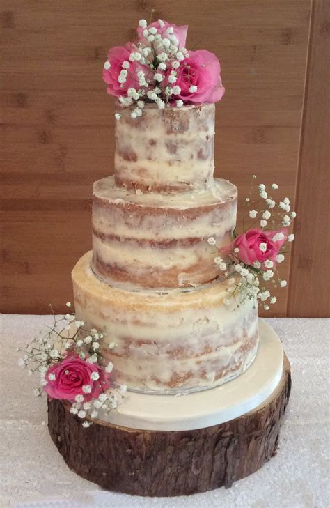 3 Tier Semi Naked Wedding Cake With Fresh Roses And Gypsophilia