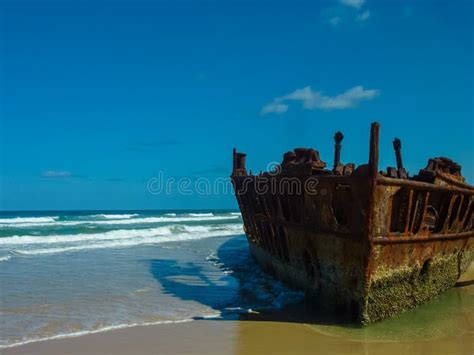Fraser Island Rusty Remains Of Ss Maheno Shipwreck Resting On Sandy