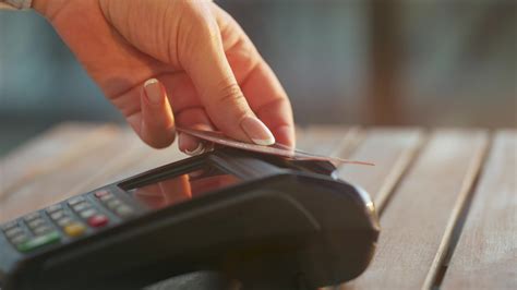 Nfc Credit Card Payment Woman Paying With Contactless Credit Card With Nfc Technology Wireless