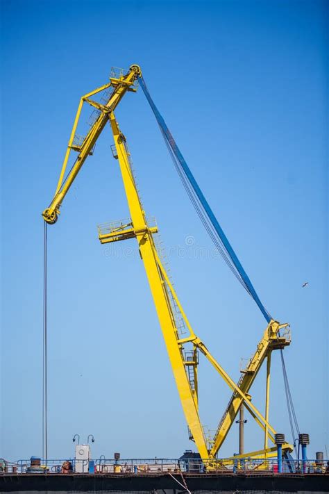 Container Terminal With Cranes In A Commercial Port Stock Image