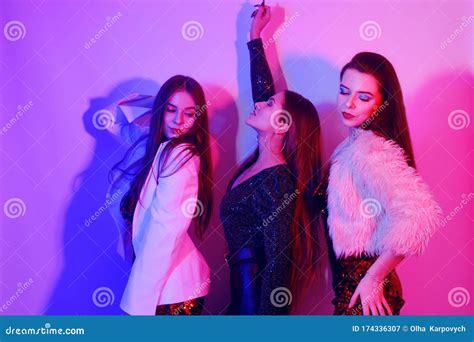 Three Beautiful Girls Are Dancing In Neon An Incredibly Fun Party With