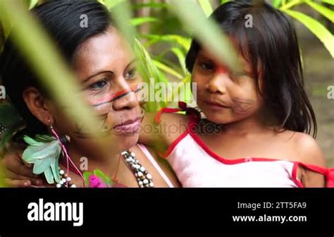 Mother And Daughter At An Indigenous Tribe In The Amazon Stock Video