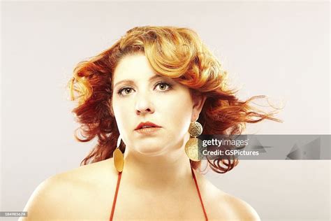 Beautiful Voluptuous Young Female Model With Hair Blowing High Res