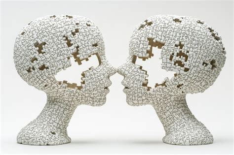 Neural Processors Prefrontal Cortex Sculptural Heads Made Of White Puzzle Pieces Facing Each