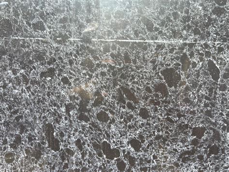 Black Fossil Iqp 717 127x64 Indo American Stones