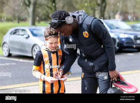 Malcolm Ebiowei 10 Of Hull City Signs An Autograph For A Fan Before