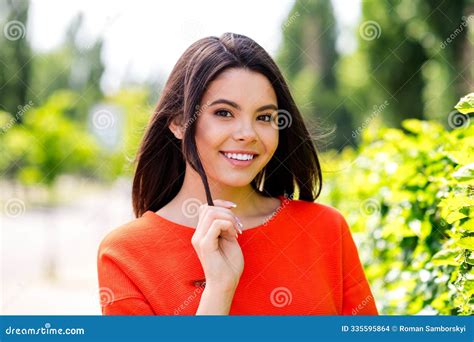 Photo Of Attractive Teen Cheerful Girl Hold Hair Strand Haircare