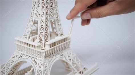 A Large Model Of The Eiffel Tower Powerpoint Background For Free Download Slidesdocs