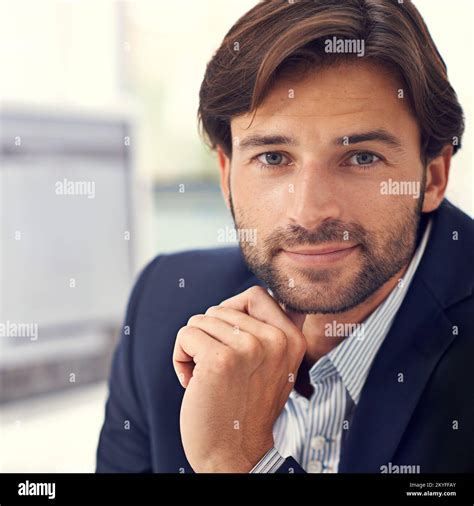Here Its Never Just Another Day At The Office Portrait Of A Handsome