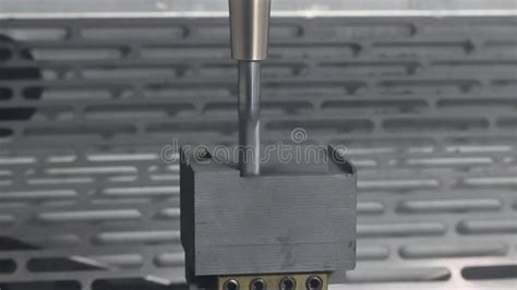 The Cnc Milling Machine Cutting The Graphite Electrode Parts Stock