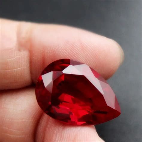 Gemstones Materials Natural Rubies Cut And Faceted Oval And Pear Shapes