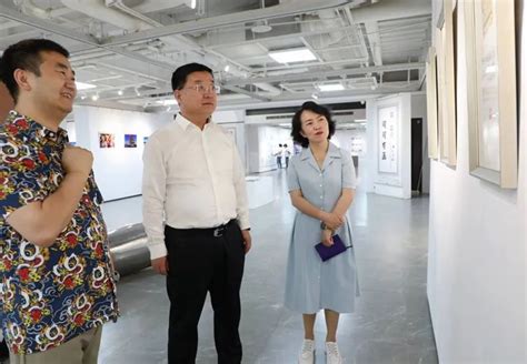 临泽县人民政府 张辉走访中国新闻社甘肃分社