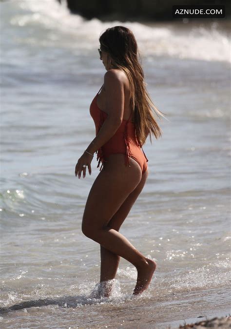 Teresa Giudice In A Peach One Piece Swimsuit As She Takes A Stroll