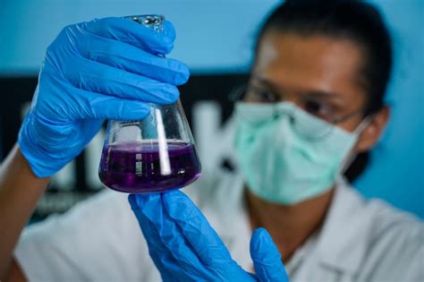 Premium Photo A Team Of Biochemical Research Scientists Work With In