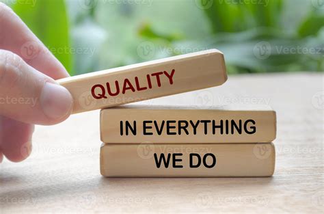 Quality In Everything We Do Text On Wooden Blocks Business Quality