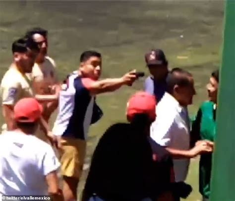 Terrifying Moment Man Pulls Out Gun And Threatens Referee And Players
